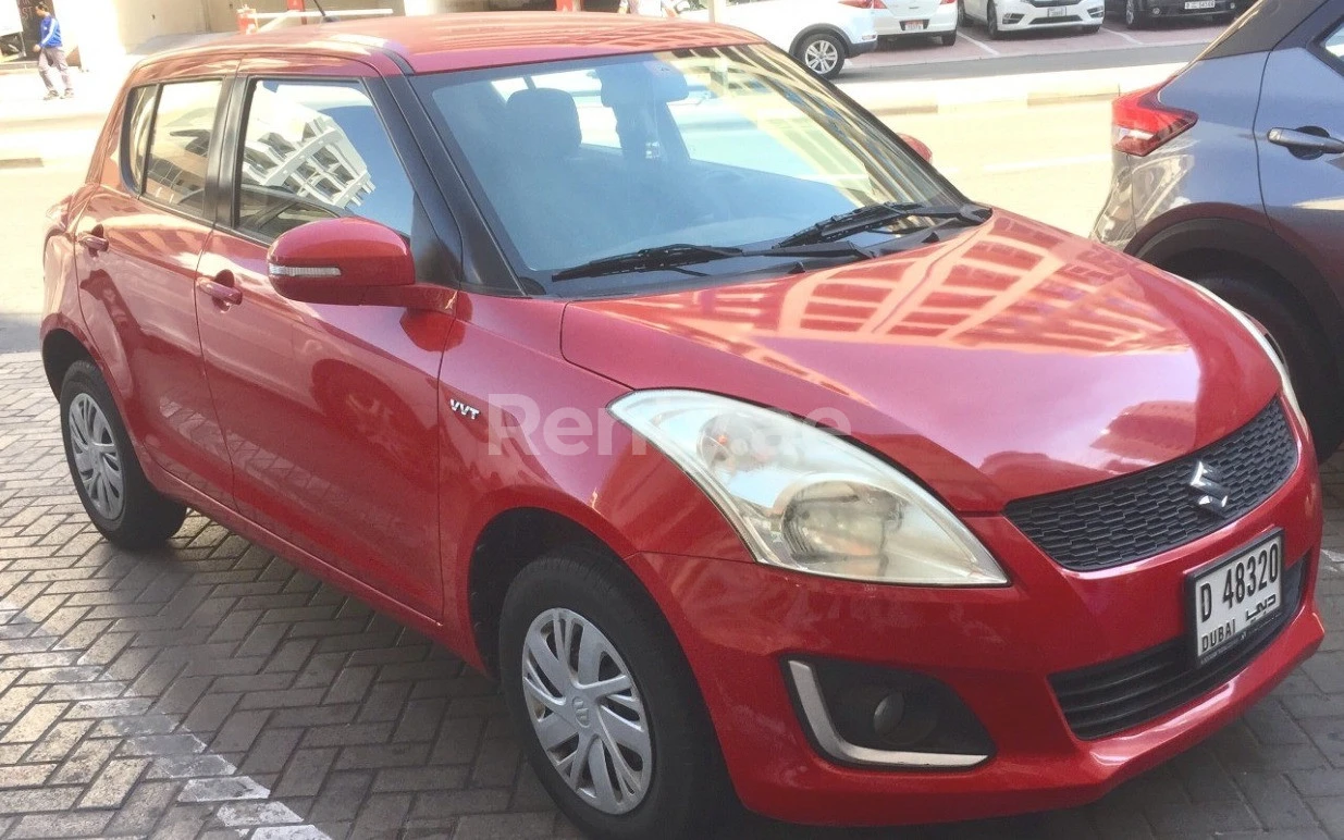Rent a Suzuki Swift (Red), 2016 ID-2390, in Dubai - Evolve